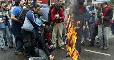 Angry Protests Greet Bush - CBS News