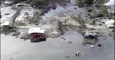 Tsunami: Dozens Dead, Thousands Homeless - CBS News