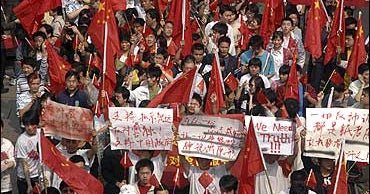 Protests Taint Olympic Hoopla - CBS News