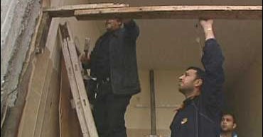 Gazan Family Opens What's Left Of A Home - CBS News
