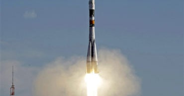 Russian Rocket, 3 Crew, Head for Space Station - CBS News
