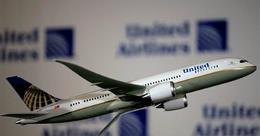 United, Continental Agree to Merge - CBS News