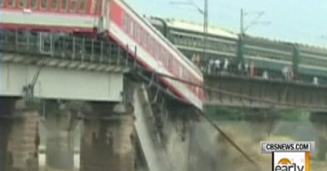Shocking Video: Train Cars Dangle off Flood-Damaged Bridge in China ...