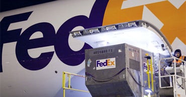 Warm-Up for Santa: FedEx's Busiest Day - CBS News