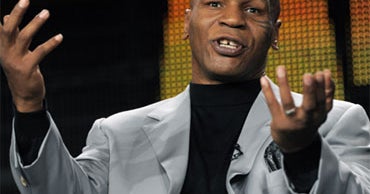 Mike Tyson Shows Love of Racing Pigeons on Show - CBS News