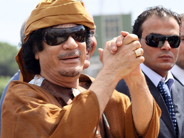 In "company town" of Tripoli, loyalty to Qaddafi - CBS News