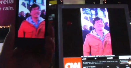 Amazing Video: Man hacks Times Square billboards with iPhone? - CBS News