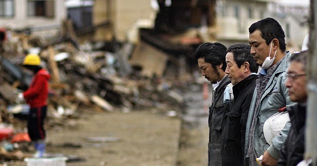 Aftershock rattles Japan; evacuation zone grows - CBS News