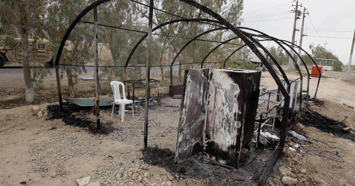 Wounded Iranian exiles forced back to Iraqi camp - CBS News
