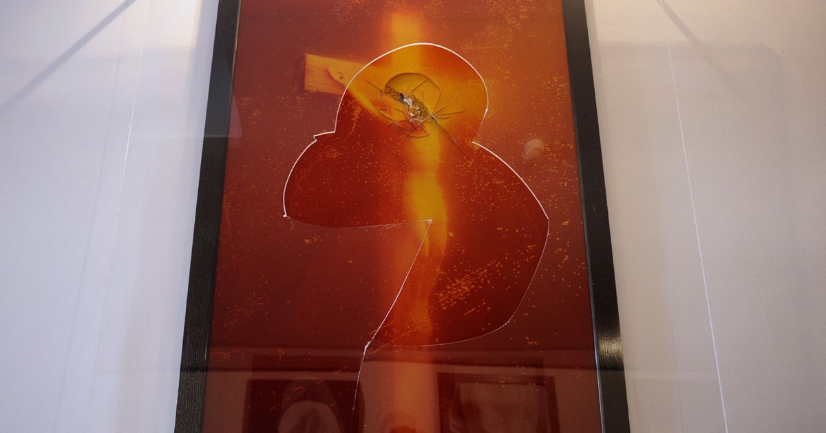 "Piss Christ" art piece attacked in France - CBS News