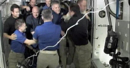 Endeavour crew bids farewell to Space Station crew - CBS News