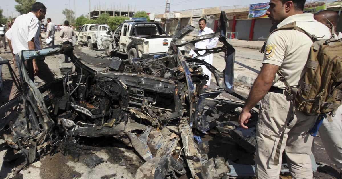 Scores killed as Iraq hit by wave of bombings - CBS News