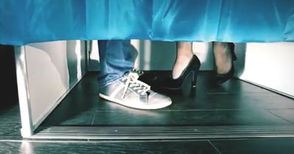 Russian voting booths heat up in new ad - CBS News