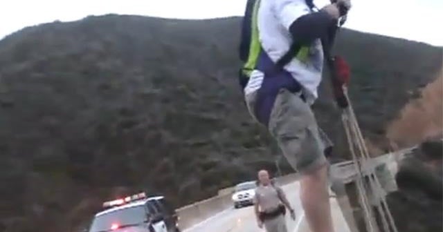 Outlaw basejumper leaps off a bridge - CBS News