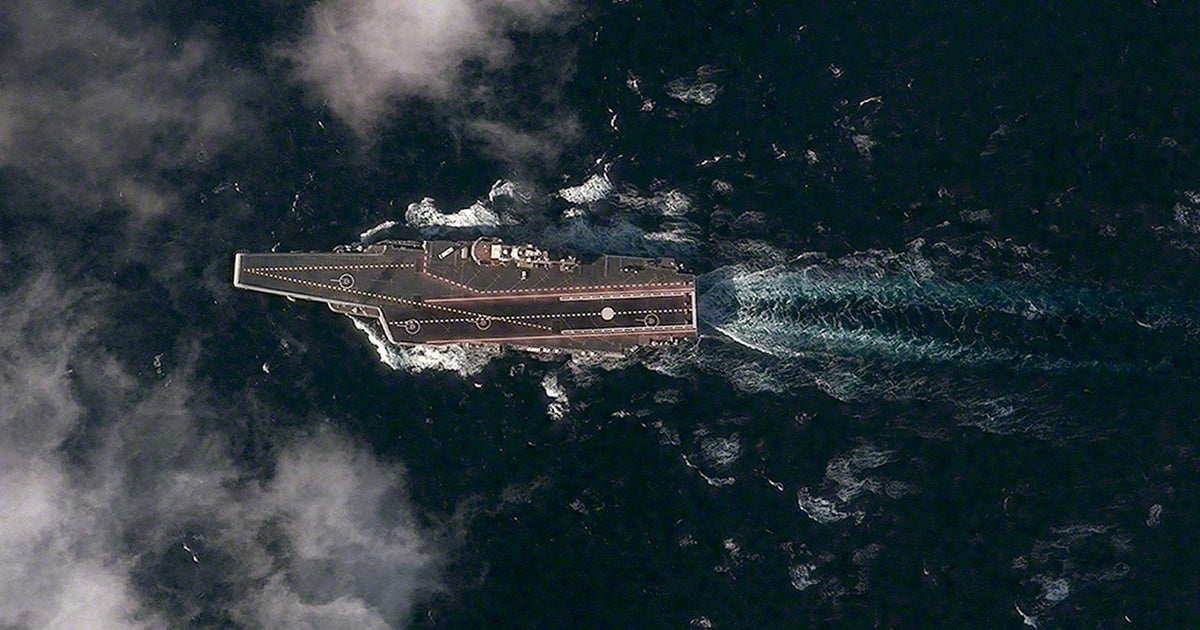 China's first aircraft carrier spotted at sea - CBS News