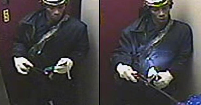 Man arrested in elevator burning death - CBS News