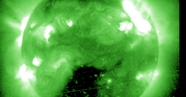 Massive solar eruption bombards Earth - CBS News