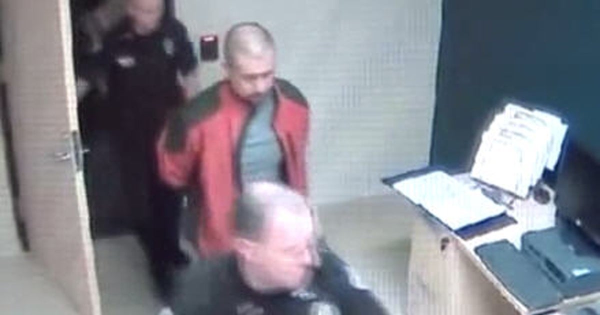 Video shows Zimmerman with cops; Dad speaks out - CBS News