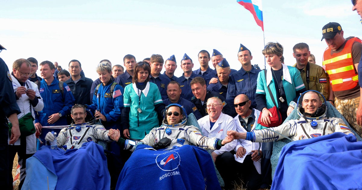 Soyuz craft carrying 3-man crew lands safely - CBS News