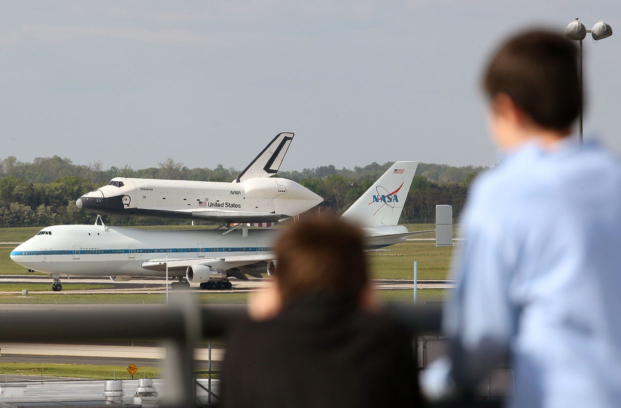 Space shuttle Enterprise flies over NYC
