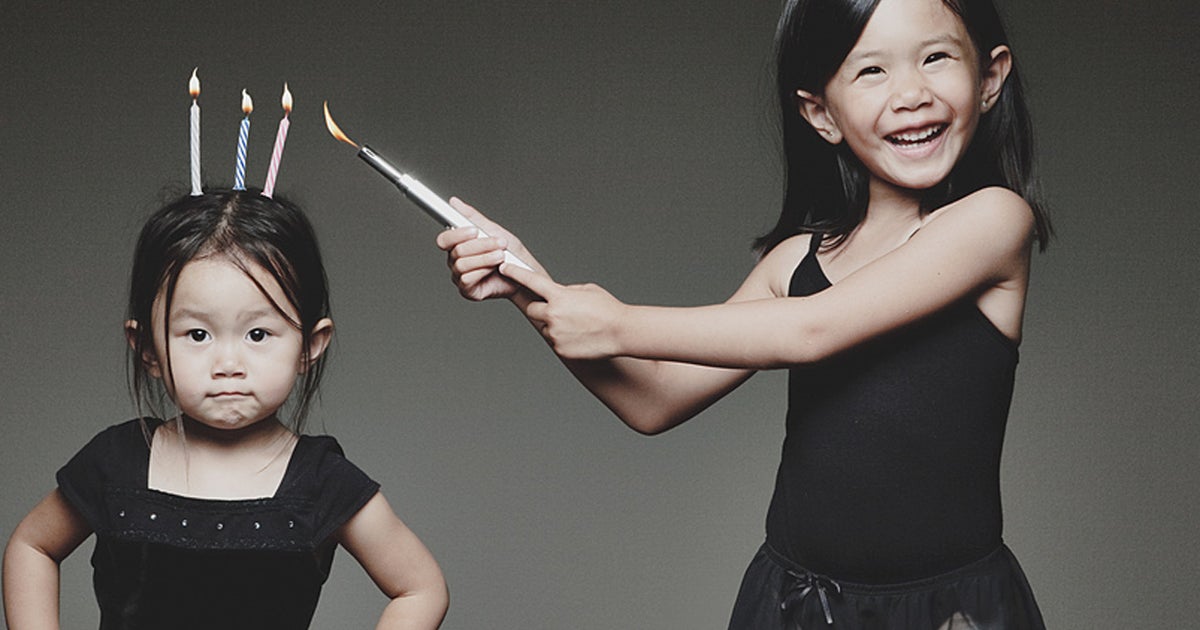 Photographer's cute and creative family photos - CBS News