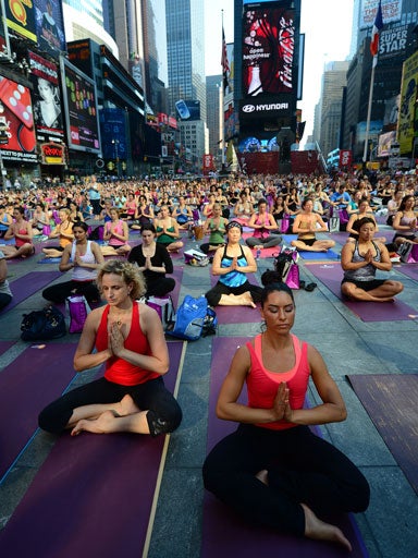 Yoga takes over Times Square for summer solstice
