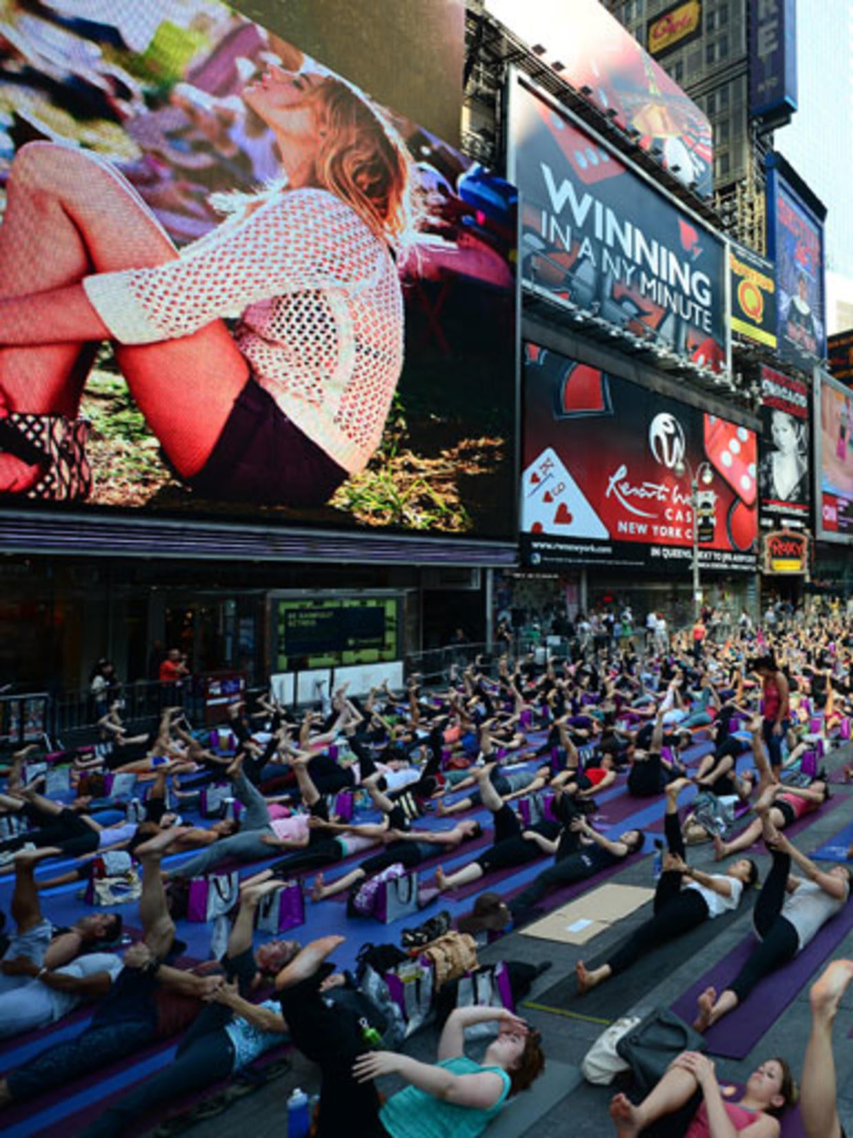 Yoga takes over Times Square for summer solstice