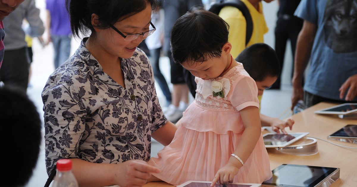 China: Apple pays $60M to settle iPad case - CBS News