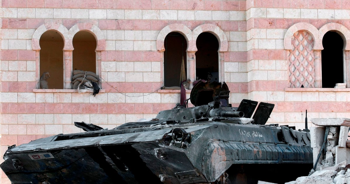 Syria rushes reinforcements to its largest city - CBS News