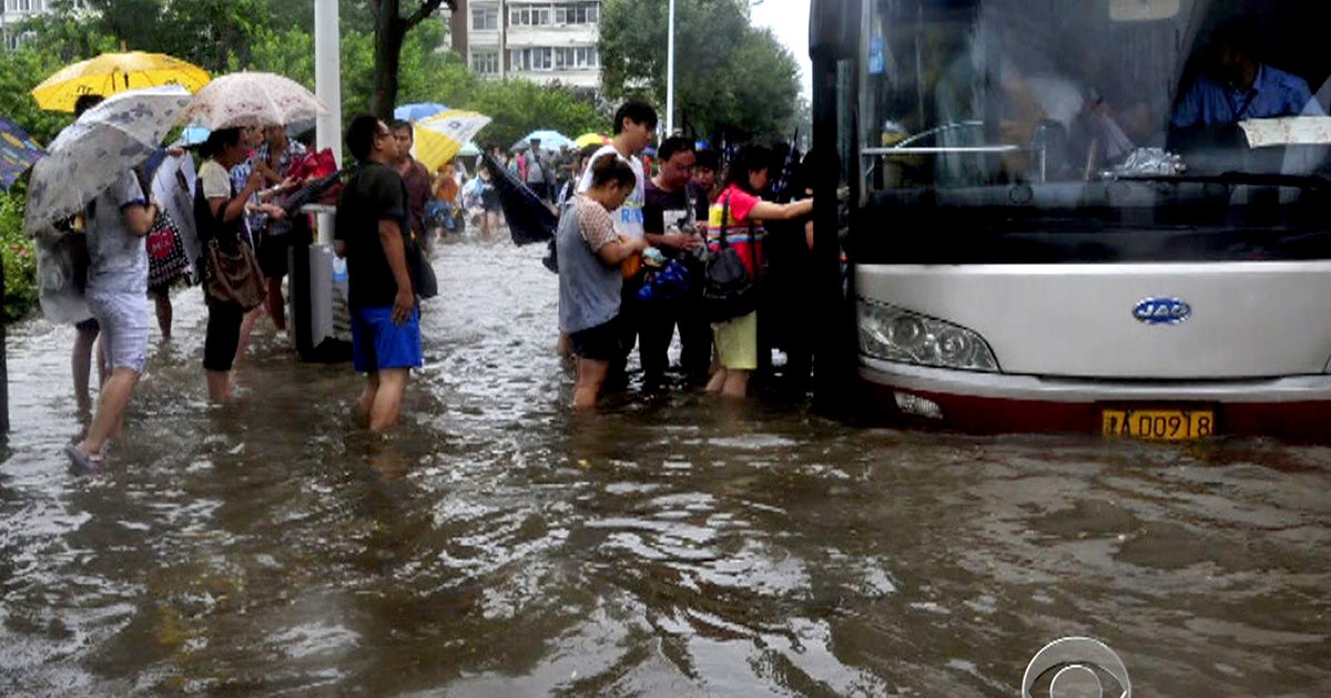 Beijing's deadly floods cast doubt on China's building boom - CBS News