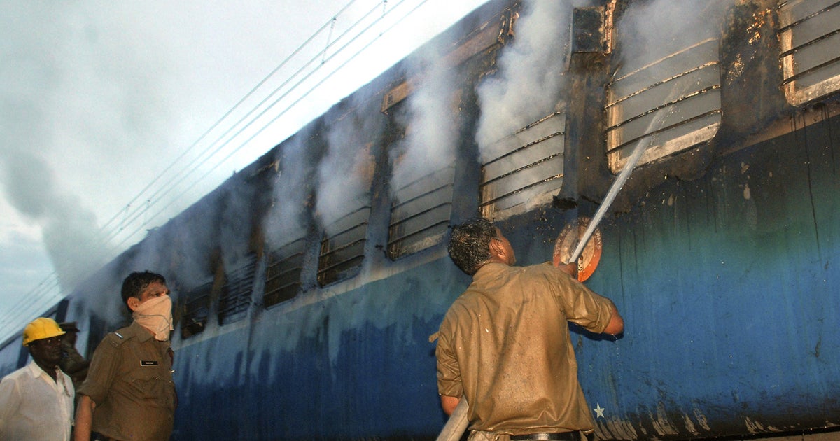 India train fire kills scores, leaves passengers scrambling for only ...