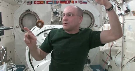 NASA astronaut Don Pettit demonstrates what yo-yos look like in space ...