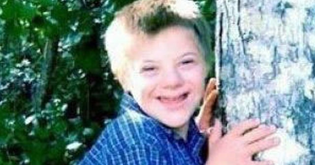 Missing boy survives overnight by cuddling with puppies, rescuers say ...