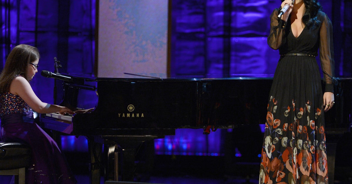 Katy Perry sings duet with 11-year-old with autism - CBS News