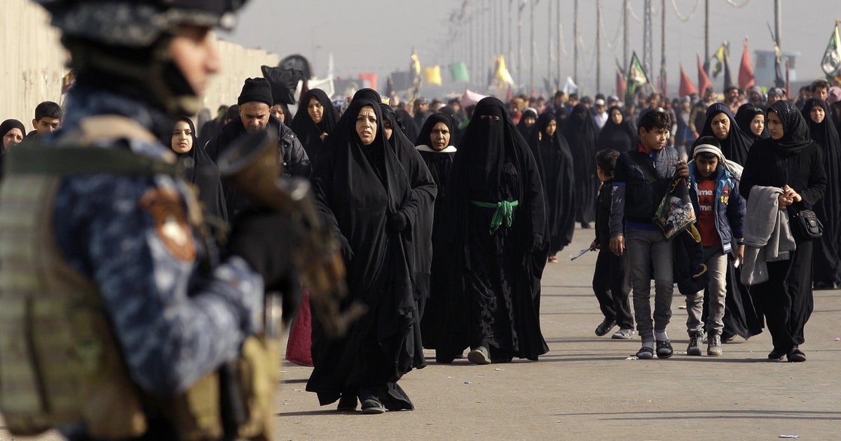 Iraq bomb attacks target Shiite pilgrims, police officer's family ...