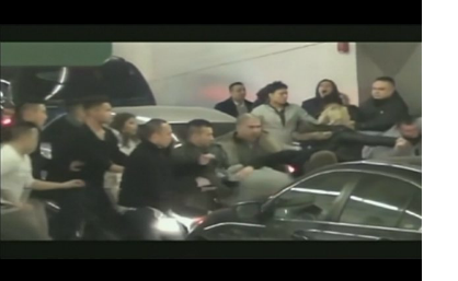 VIDEO: Massive fight breaks out in Boston parking garage - CBS News