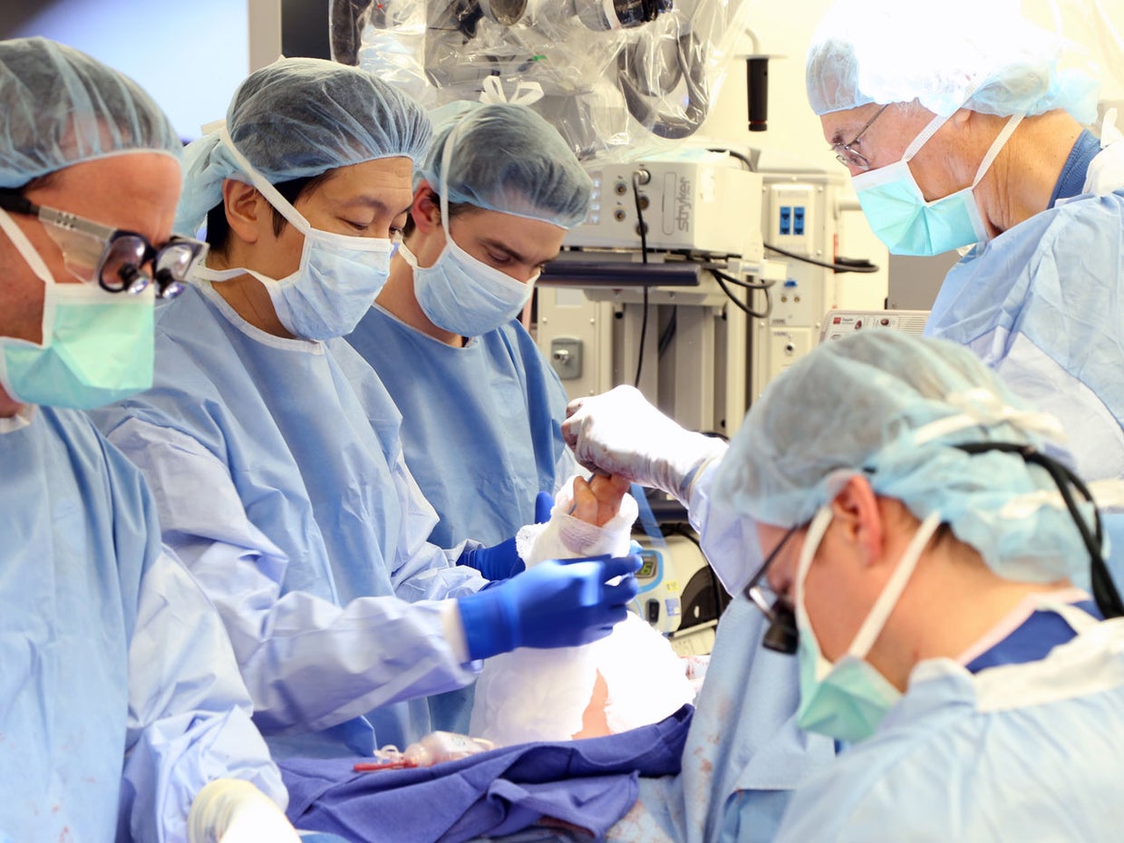 Quadruple amputee vet gets double arm transplant