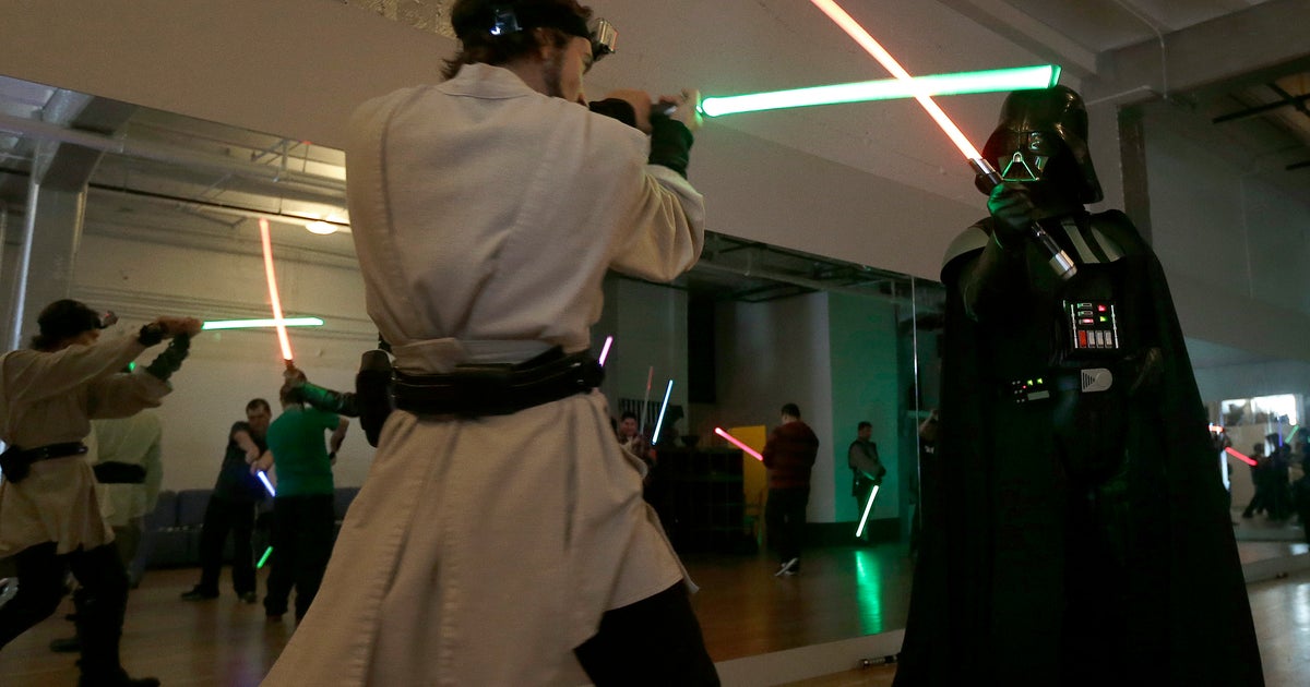 Star Wars fans get Jedi workout with light sabers