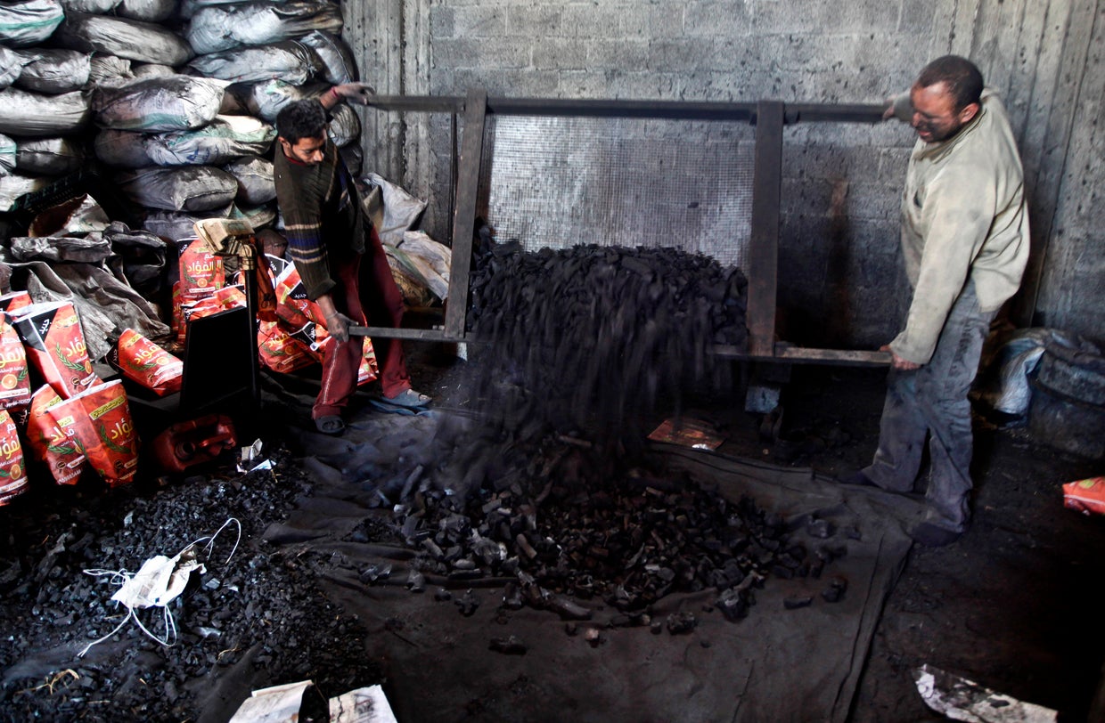 In Gaza, wood is turned to charcoal