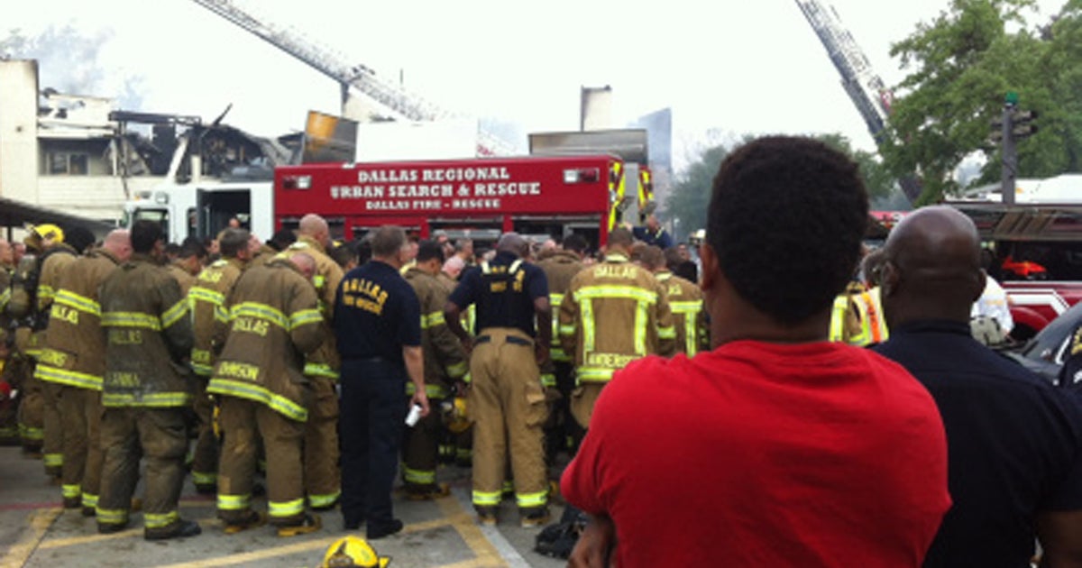 Firefighter killed in massive Dallas condo fire - CBS News