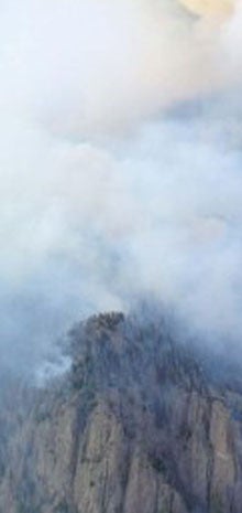 Fire threatens Colorado mountain town of 400 - CBS News