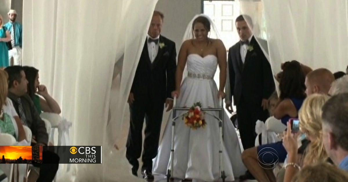 Paralyzed bride walks down the aisle - CBS News
