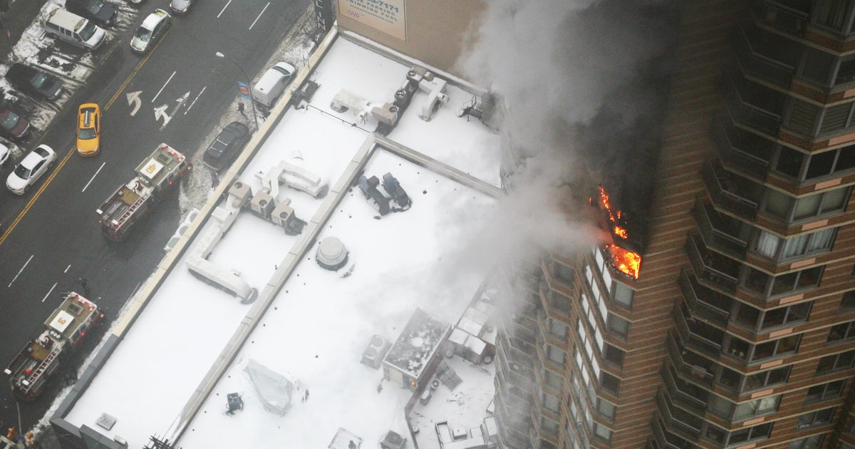 Fire at NYC high rise leaves 1 dead - CBS News
