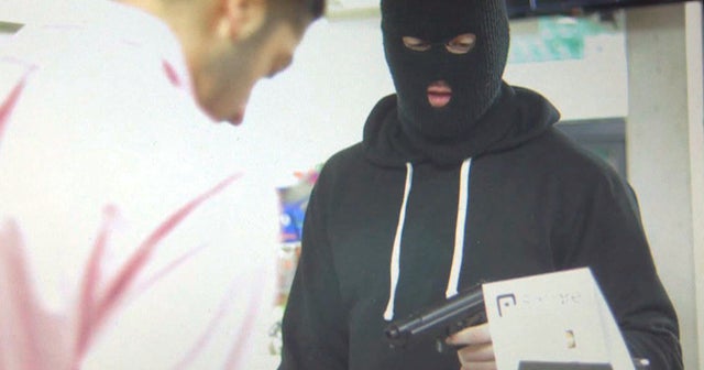 Real cops bust up fake armed robbery - CBS News