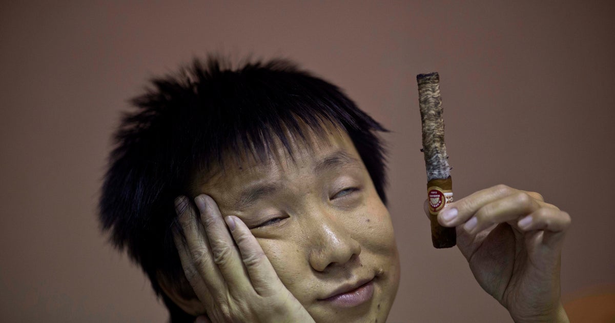 Cuba cigar festival features unusal long-ash contest - CBS News