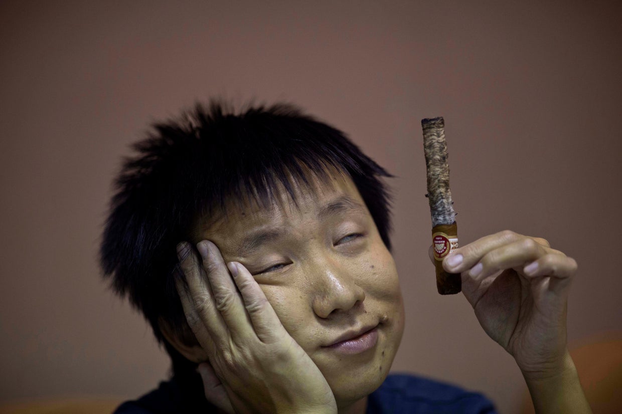 Cuba cigar festival features unusal long-ash contest - CBS News