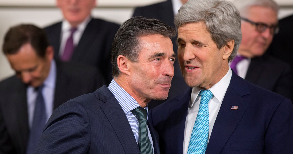 NATO severs civilian and military cooperation with Russia - CBS News