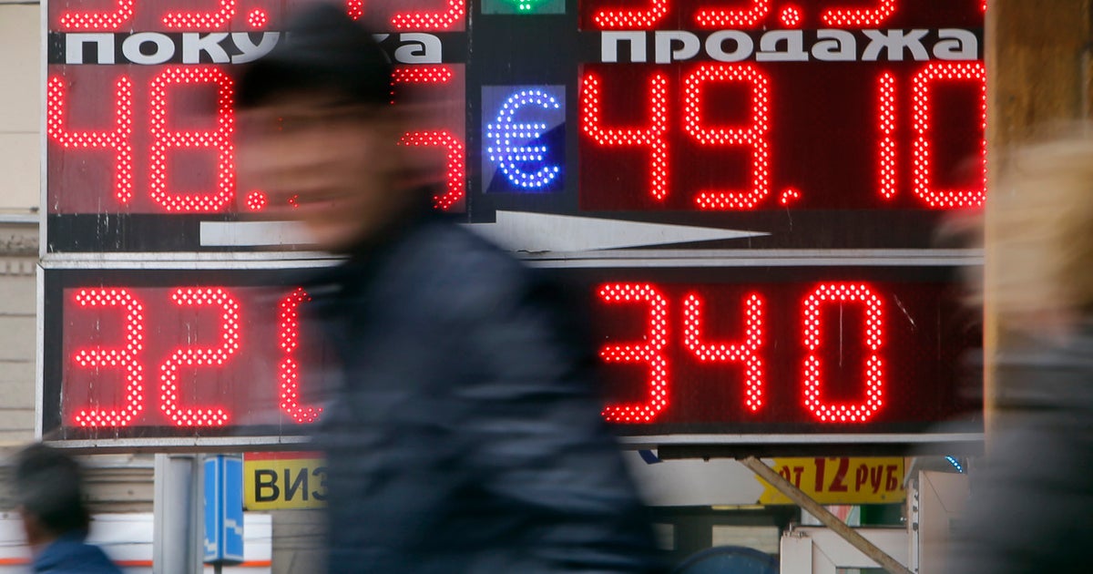 Russia credit rating cut amid Ukraine crisis - CBS News