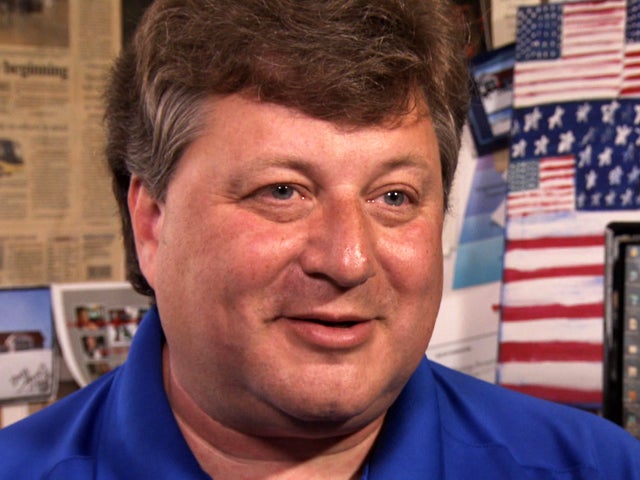 Threads of American history restore 9/11 flag to old glory - CBS News