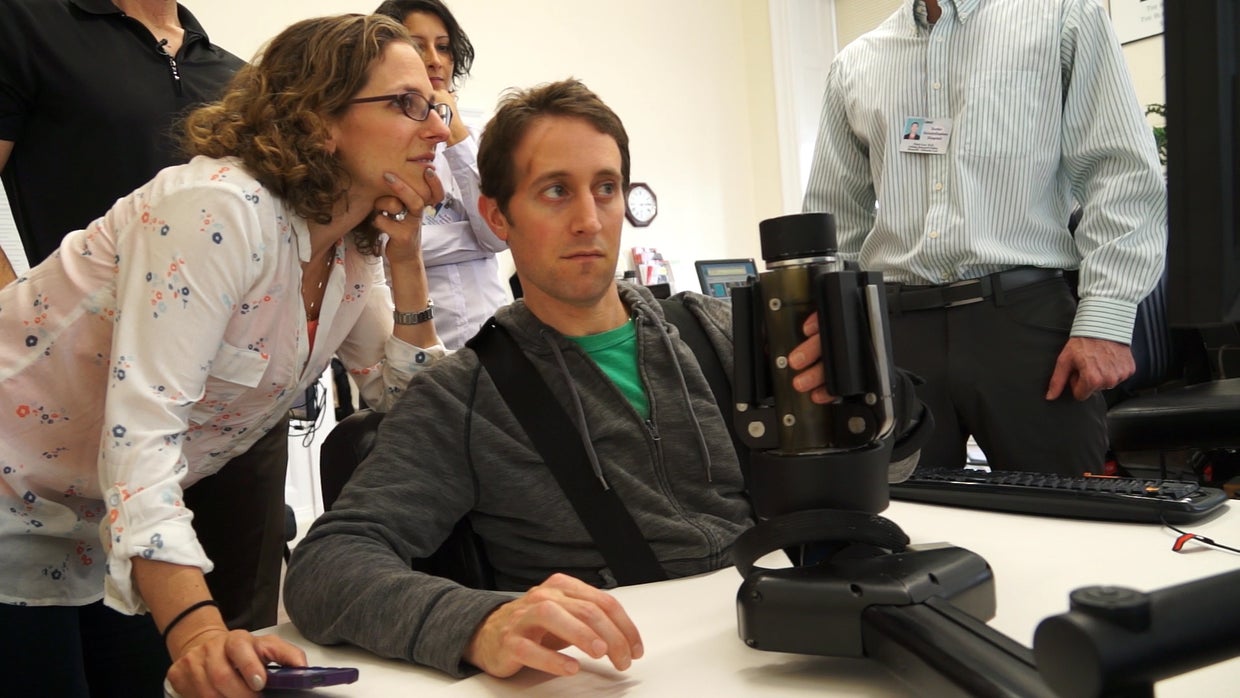 How robotic rehab may help young stroke victim reclaim future - CBS News